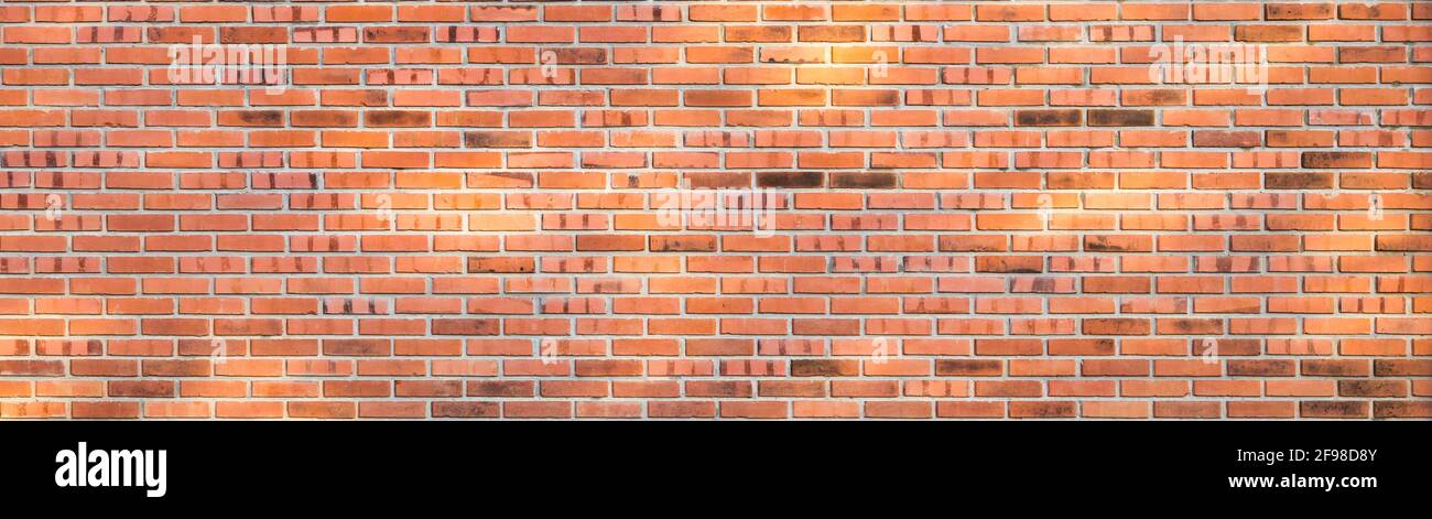 Panoramic background of a red brick wall under the sunlight Stock Photo ...
