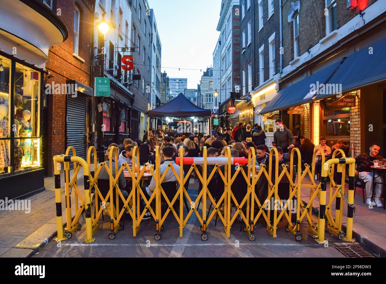 A busy bar in Bateman Street, Soho.Crowds of people packed the bars and ...