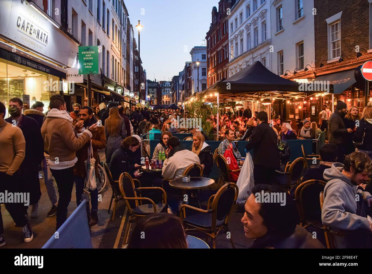 London, UK. 16th Apr, 2021. Busy bars and restaurants in Old Compton ...