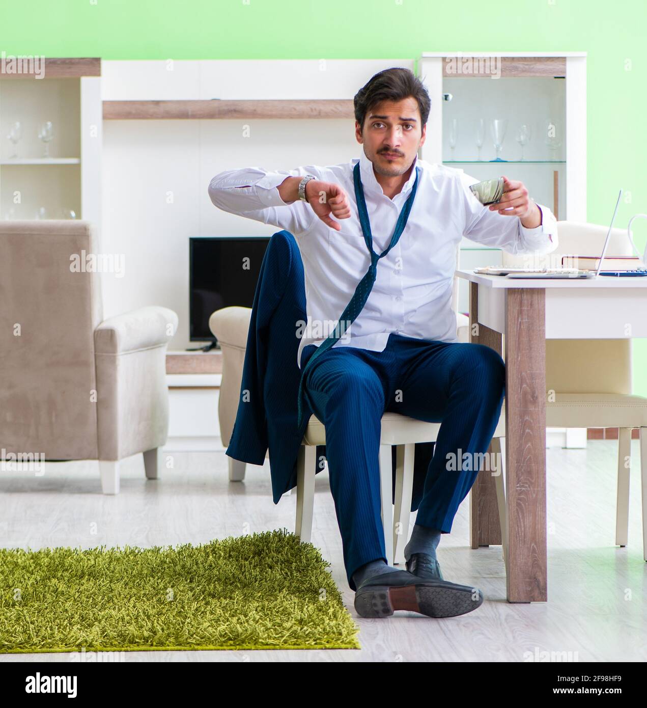 The man dressing up and late for work Stock Photo - Alamy