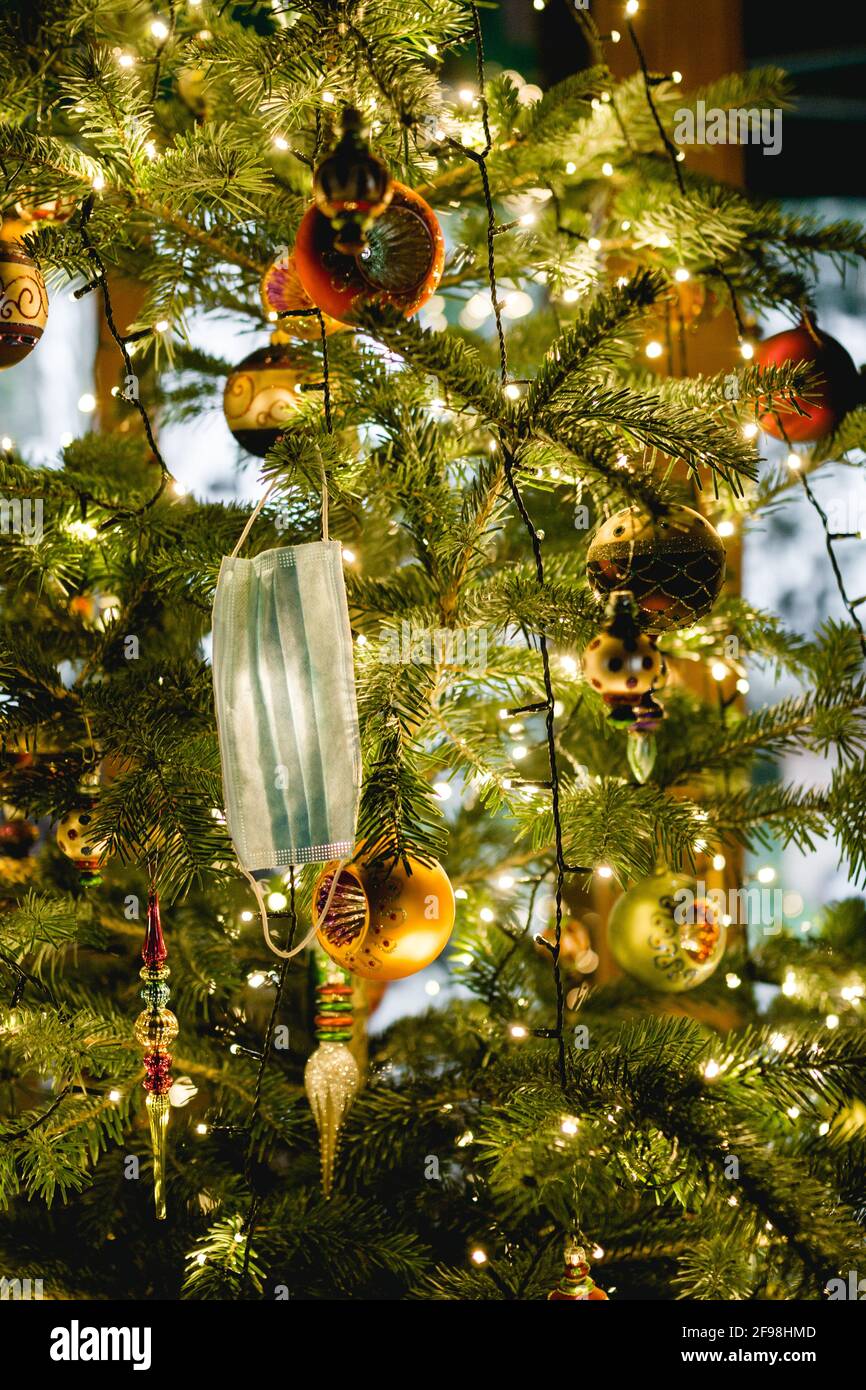 Christmas in corona times with mask on christmas tree hi-res stock ...