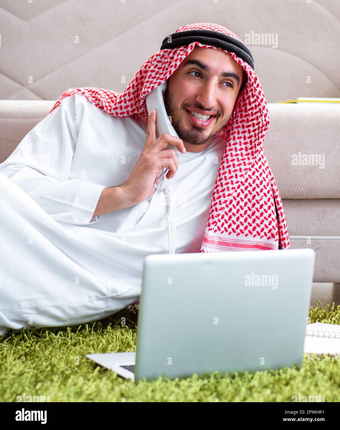 The arab man working at home on his work Stock Photo - Alamy