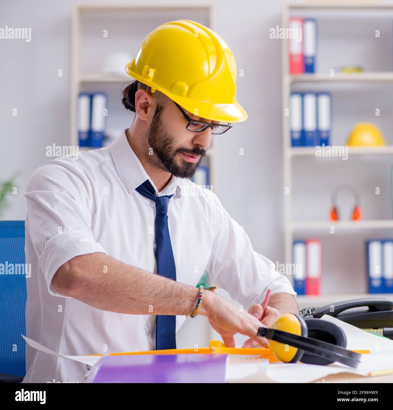 The architect working in his studio on new project Stock Photo - Alamy