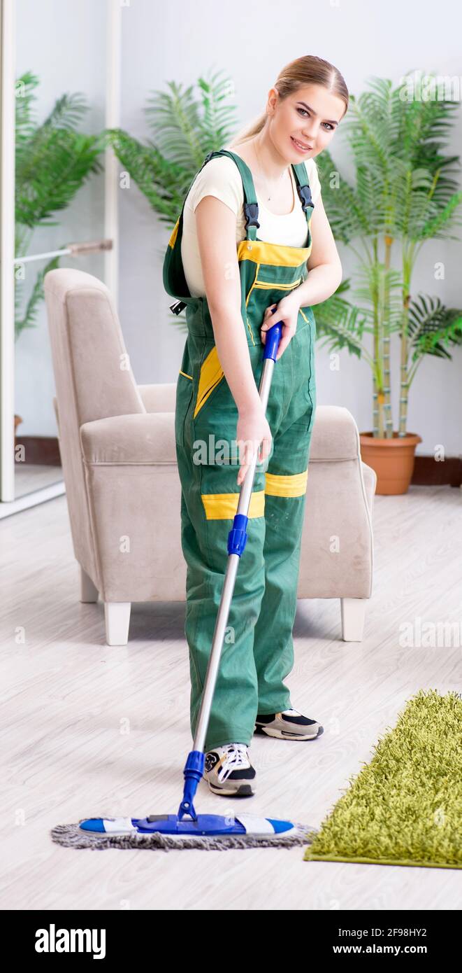 The woman female cleaner cleaning floor Stock Photo - Alamy