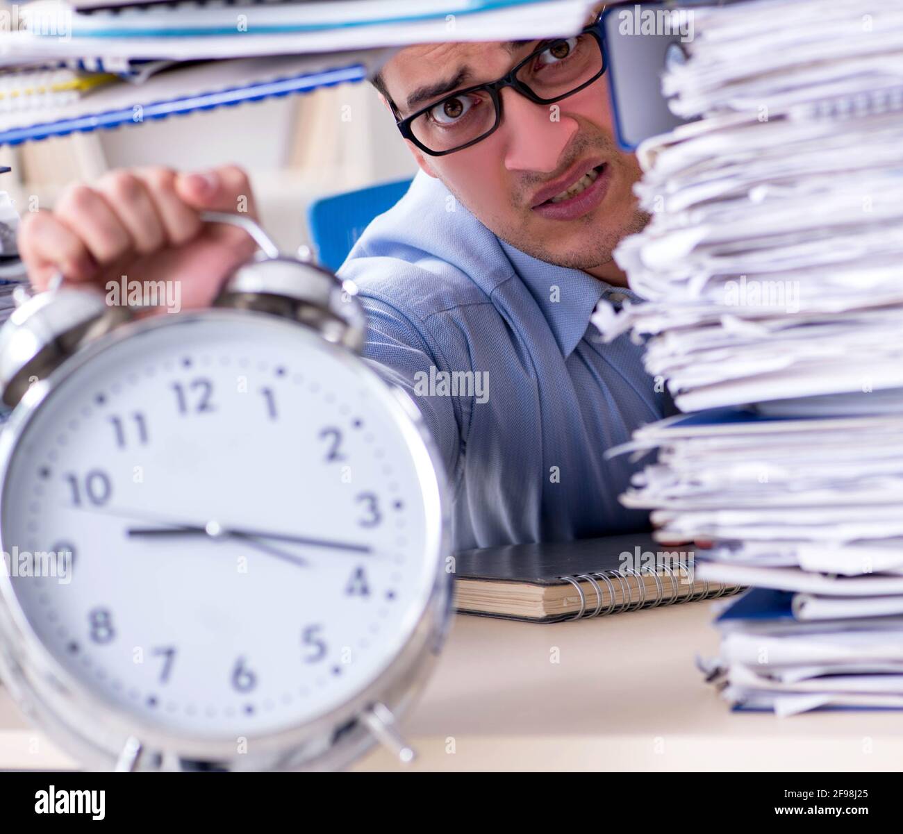 The extremely busy businessman working in office Stock Photo - Alamy