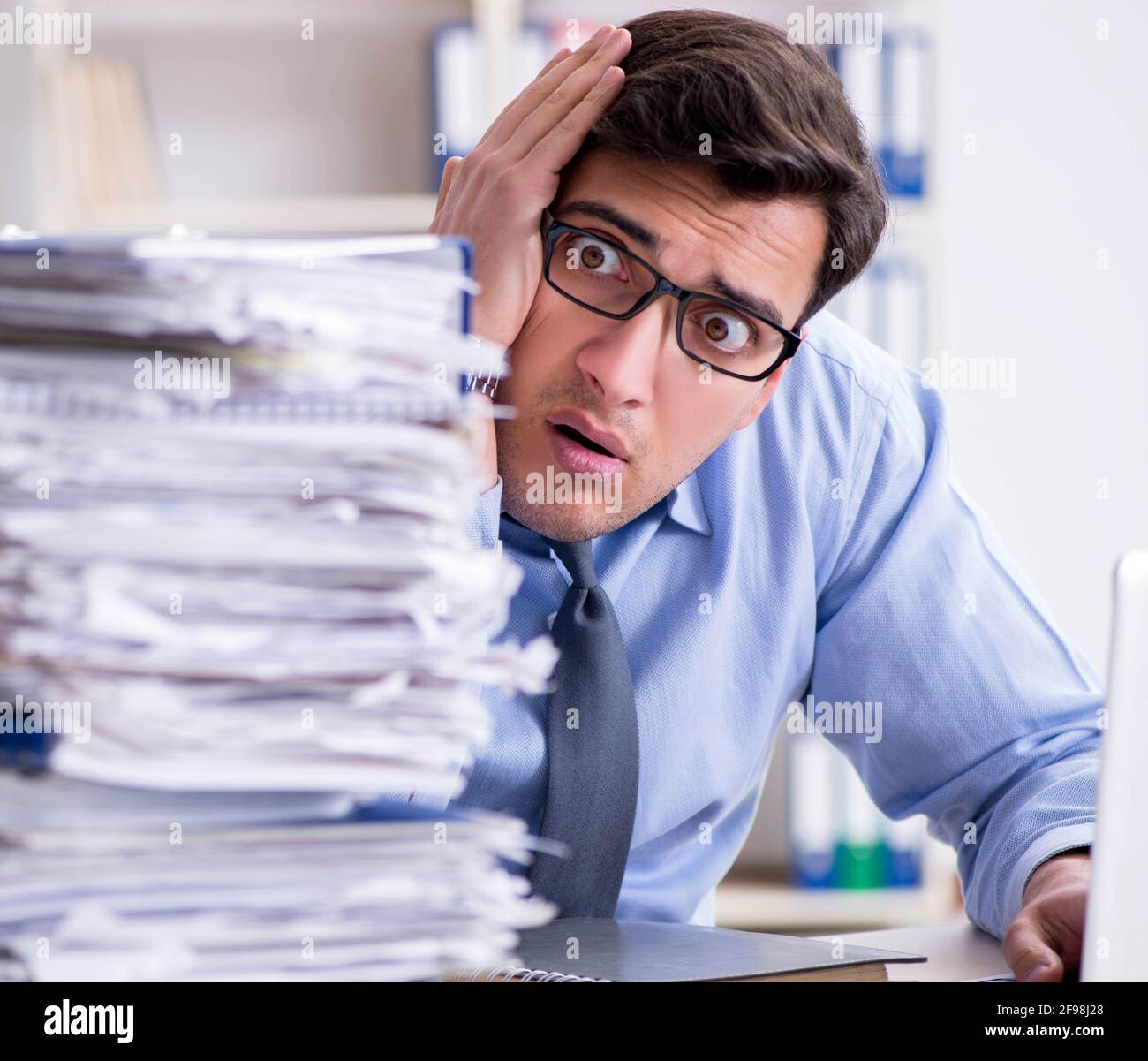The extremely busy businessman working in office Stock Photo - Alamy