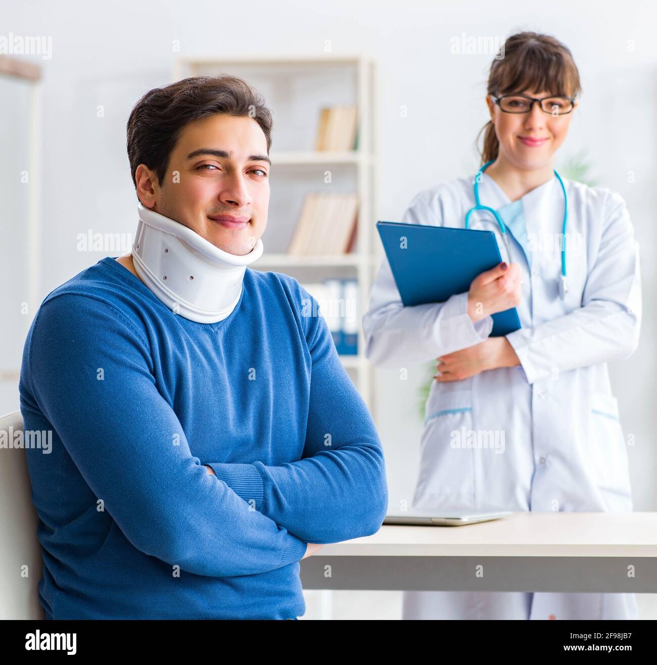 The doctor is explaining to patient with neck injury Stock Photo - Alamy