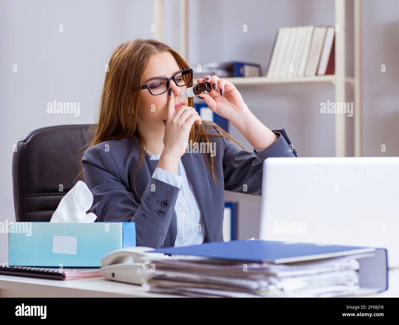 The businesswoman employee sick in the office Stock Photo - Alamy