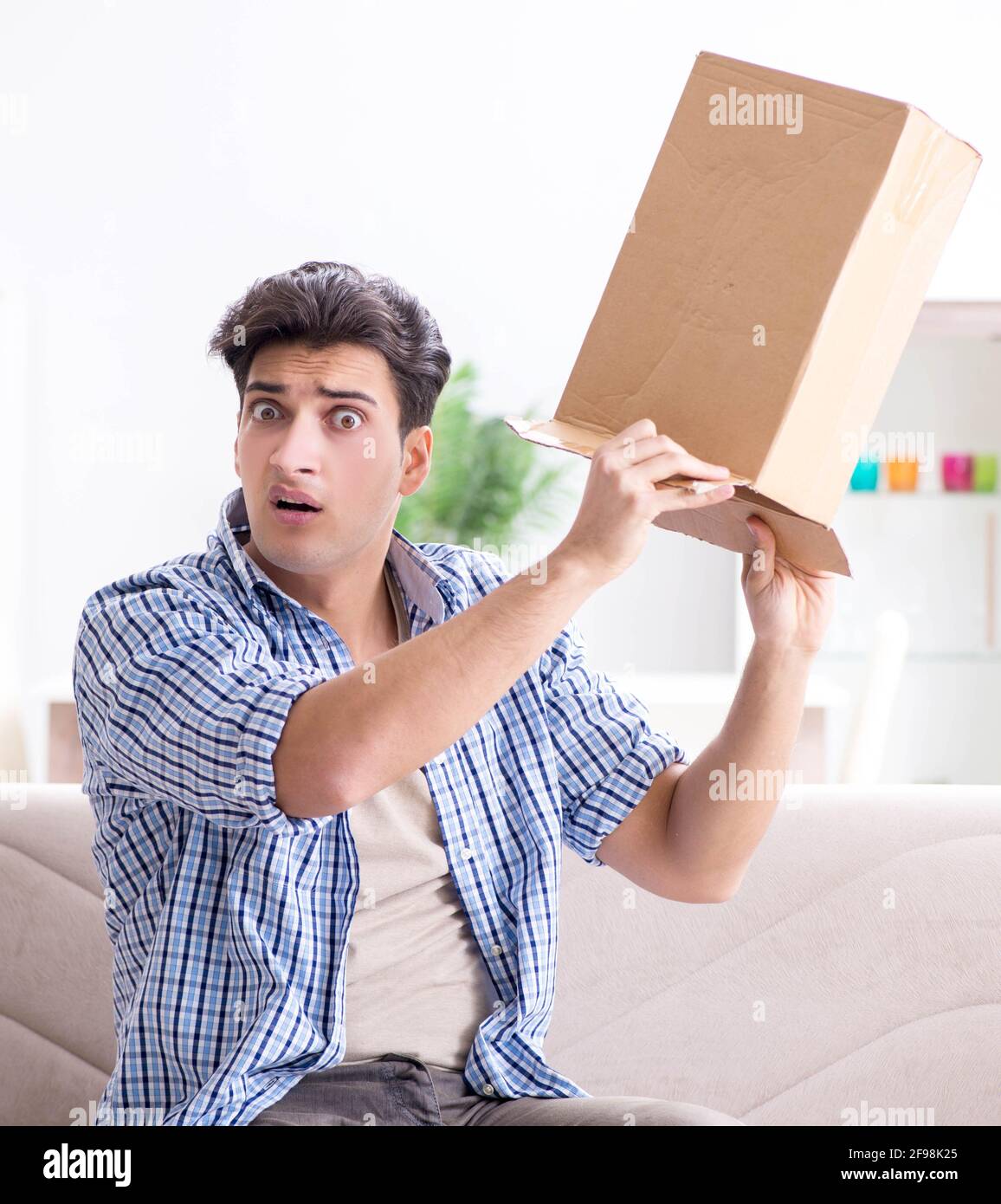 The man receiving empty parcel with stolen goods Stock Photo - Alamy
