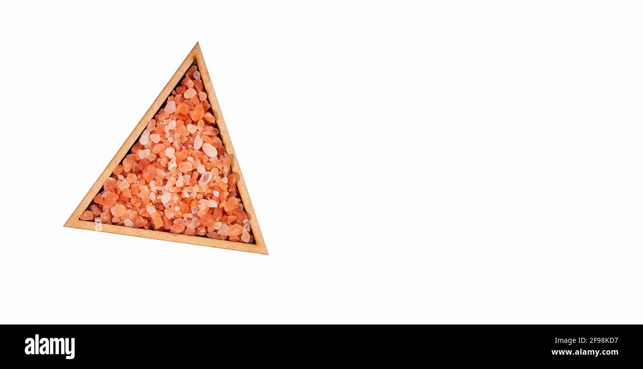 Fine-grained pink Himalayan salt in the triangular bowl Stock Photo - Alamy