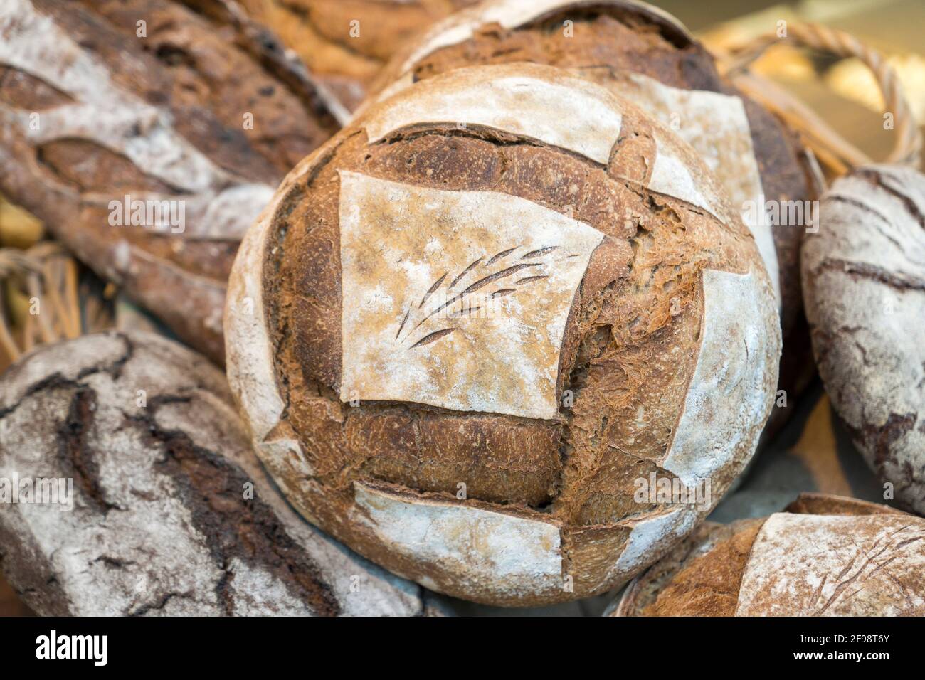 Rustic farmer's bread with ears of wheat Stock Photo - Alamy