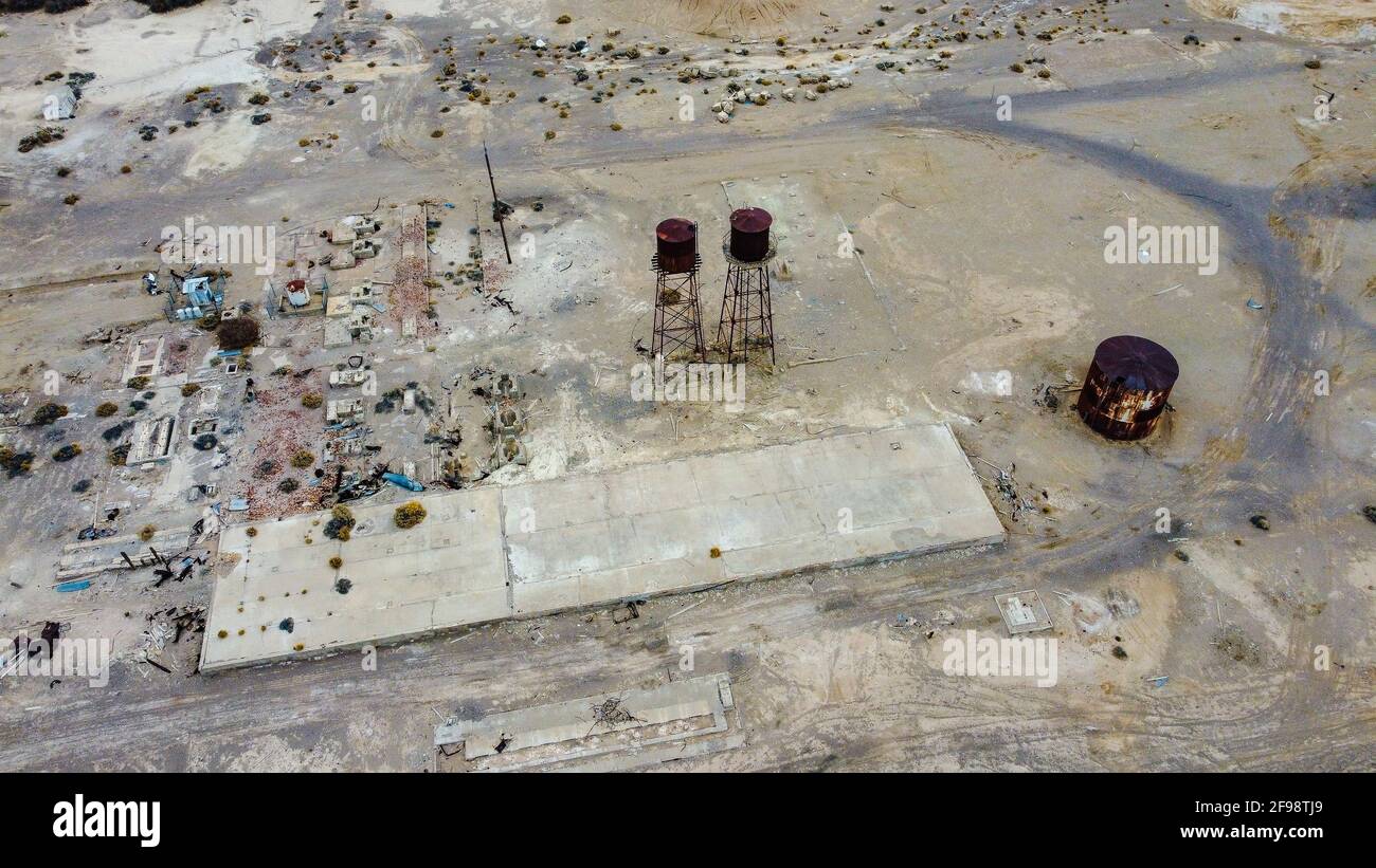 Aerial shot of the rusted water towers in the California desert Stock ...