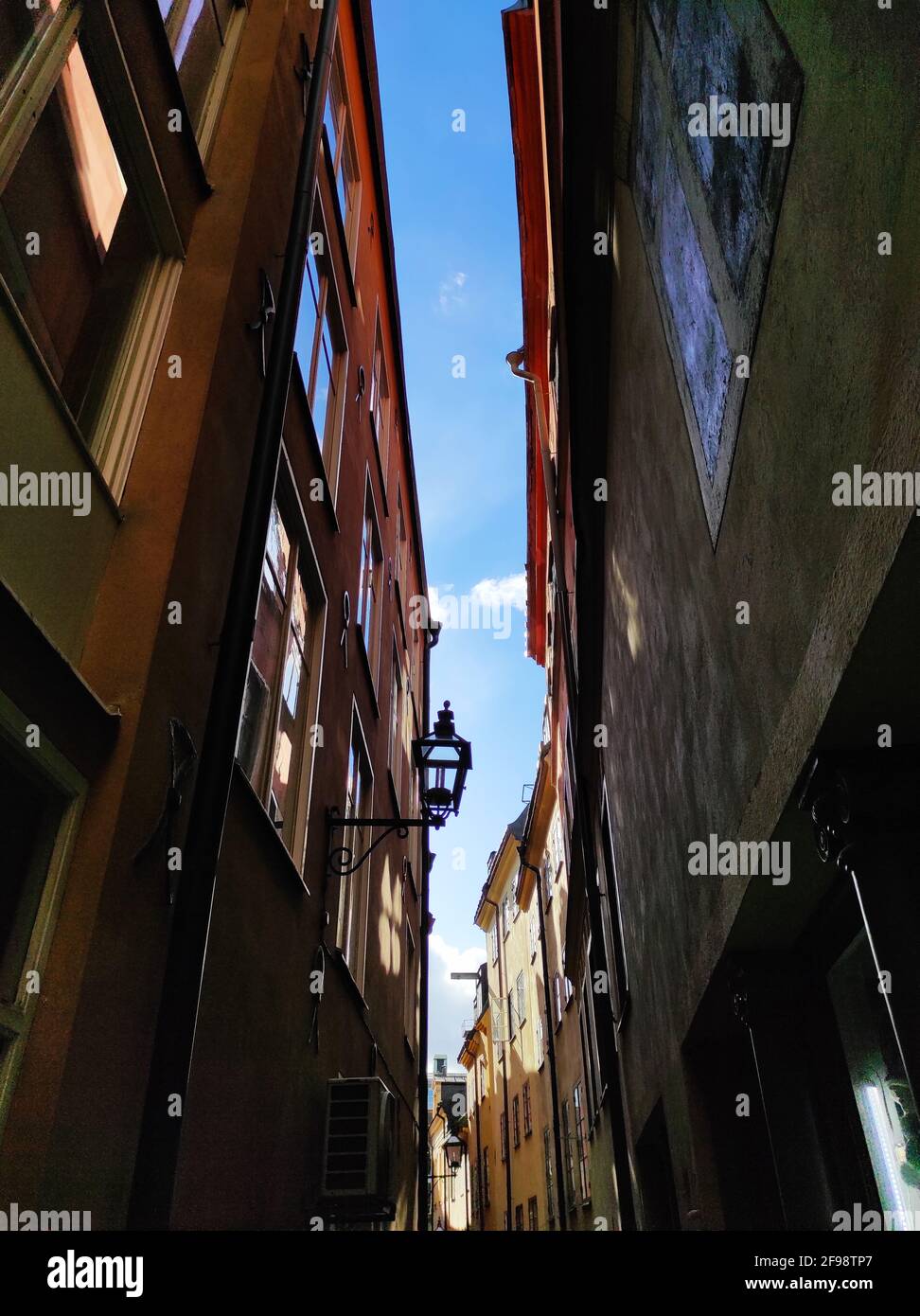 Vertical low angle shot of old buildings captured in Stockholm, Sweden ...