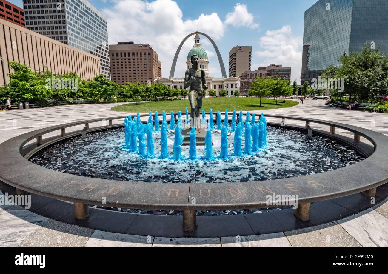 Blue water fountain with Runner Statue at Kiener Plaza Park in St ...