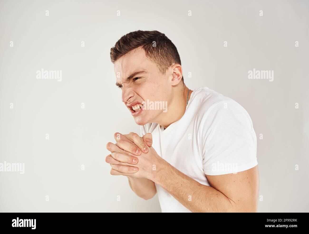 Emotions man irritability wide open mouth grin model cropped view Stock ...