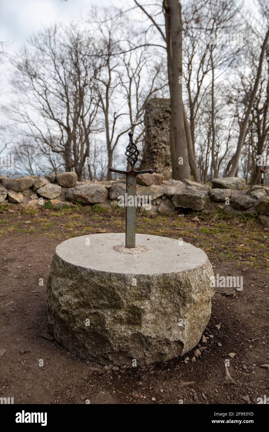 Sword stuck in a stone hi-res stock photography and images - Alamy