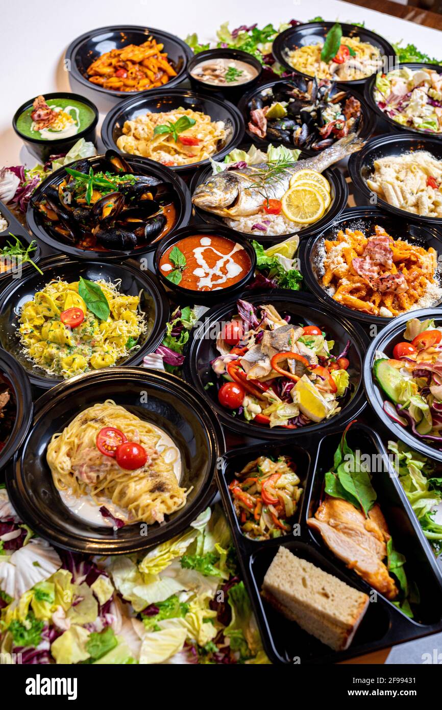 Vertical shot of a restaurant menu set on black plates - perfect food ...