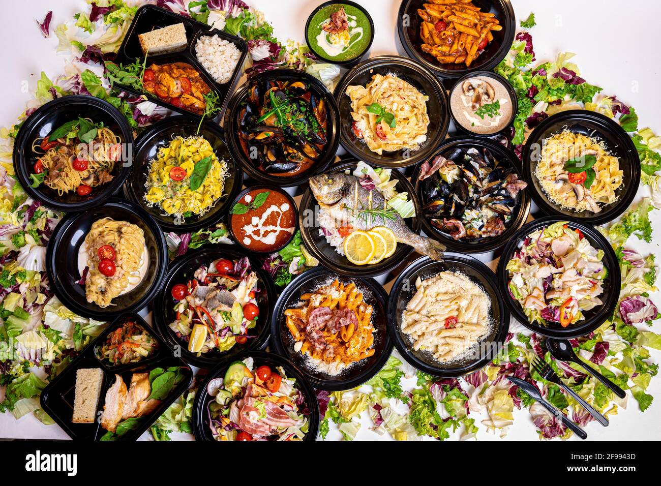 Overhead shot of a restaurant menu set on black plates - perfect food ...