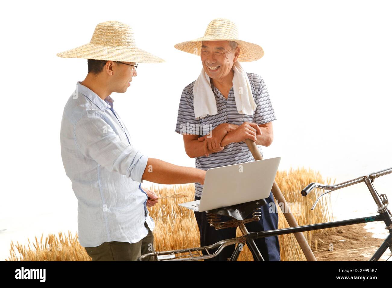 Communication technology researchers and farmers Stock Photo - Alamy
