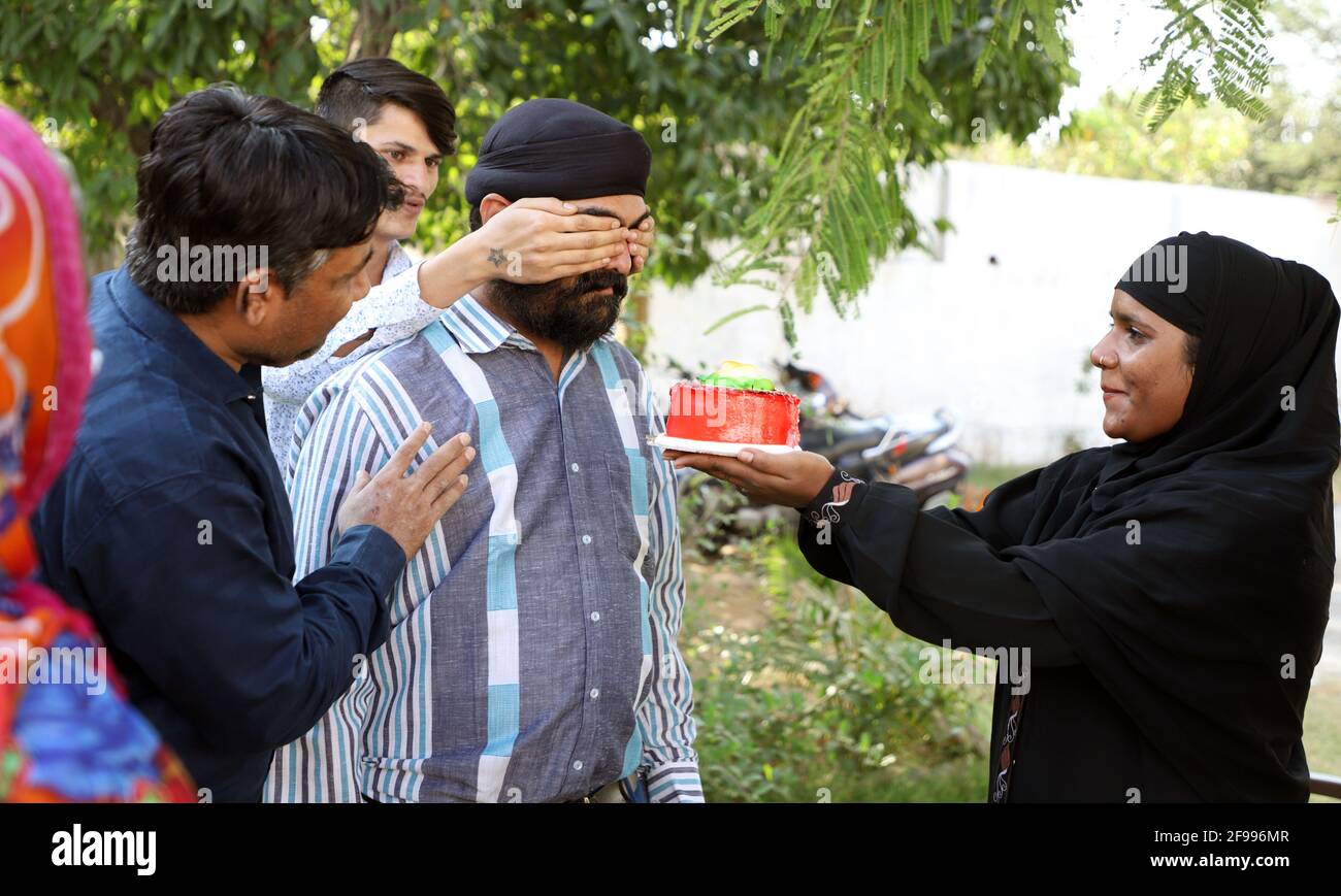 Closeup shot of Indian people making a surprise for their friend Stock ...