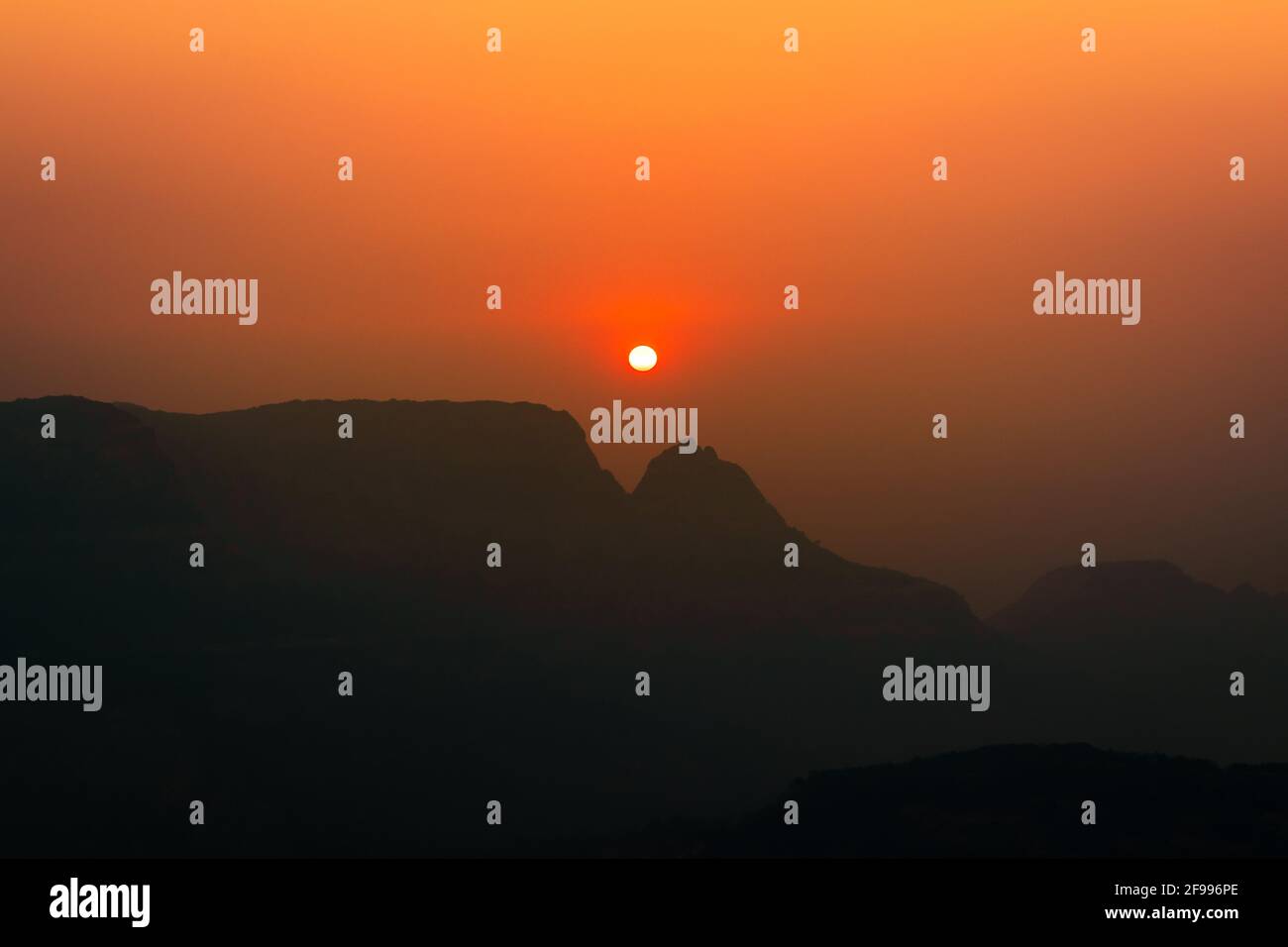 Spectacular silhouette view during sunset in Sahyadri mountain range on ...