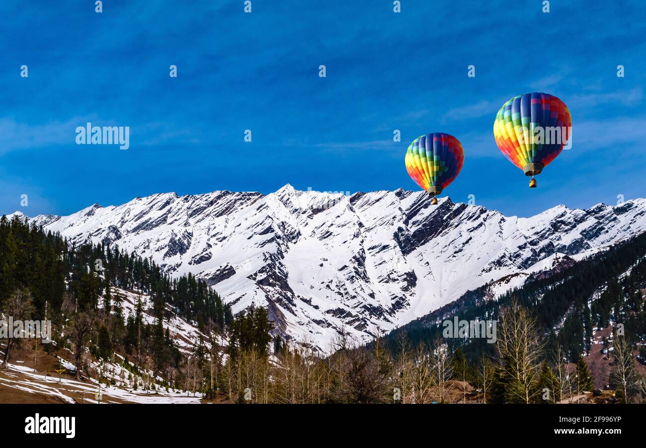 Paragliding at Solang Valley with Snow cladded mountains of Dhauladhar ...
