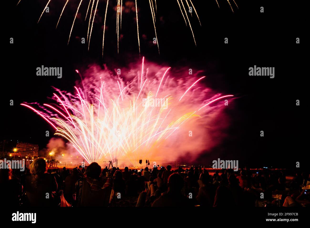 Scenic view of fireworks illuminates the sky with a dazzling display ...
