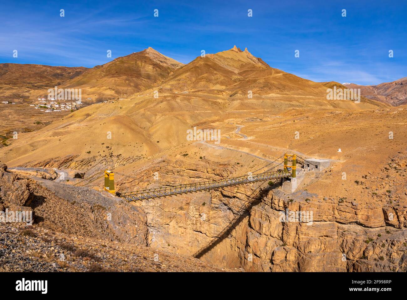 Chicham bridge is suspension stiffened steel truss bridge at altitude ...
