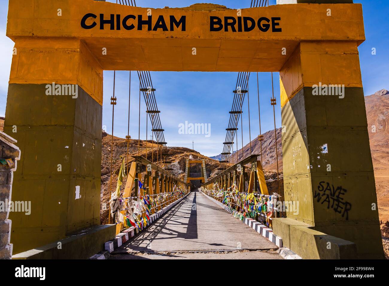 Chicham bridge is suspension stiffened steel truss bridge at altitude ...