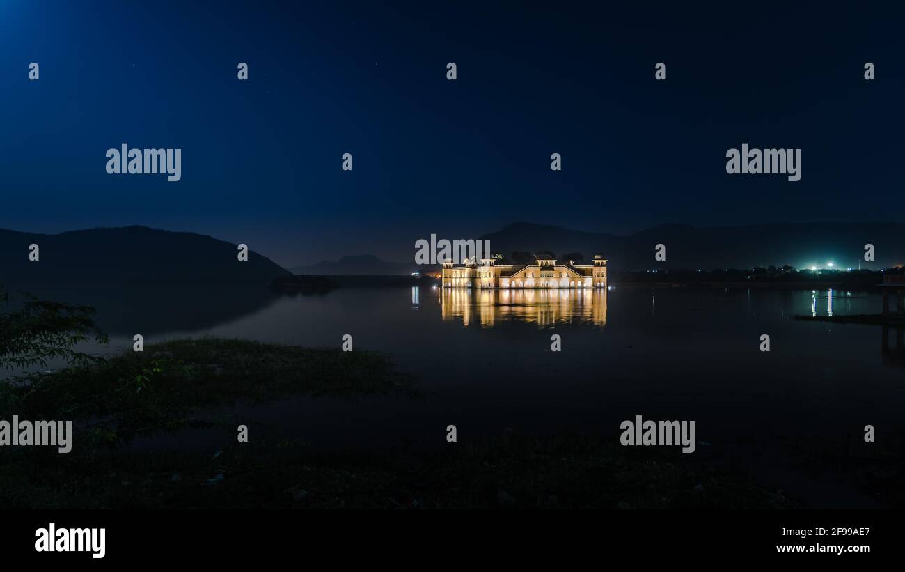 Illuminated night view of Jal Mahal 'Water Palace' is an architectural ...