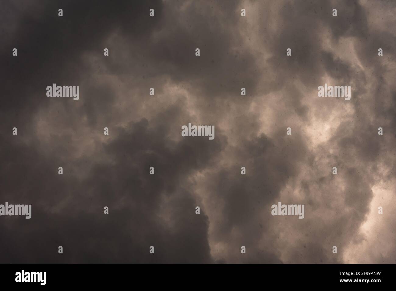 Background of dark clouds before a thunder-storm. They are formed due ...