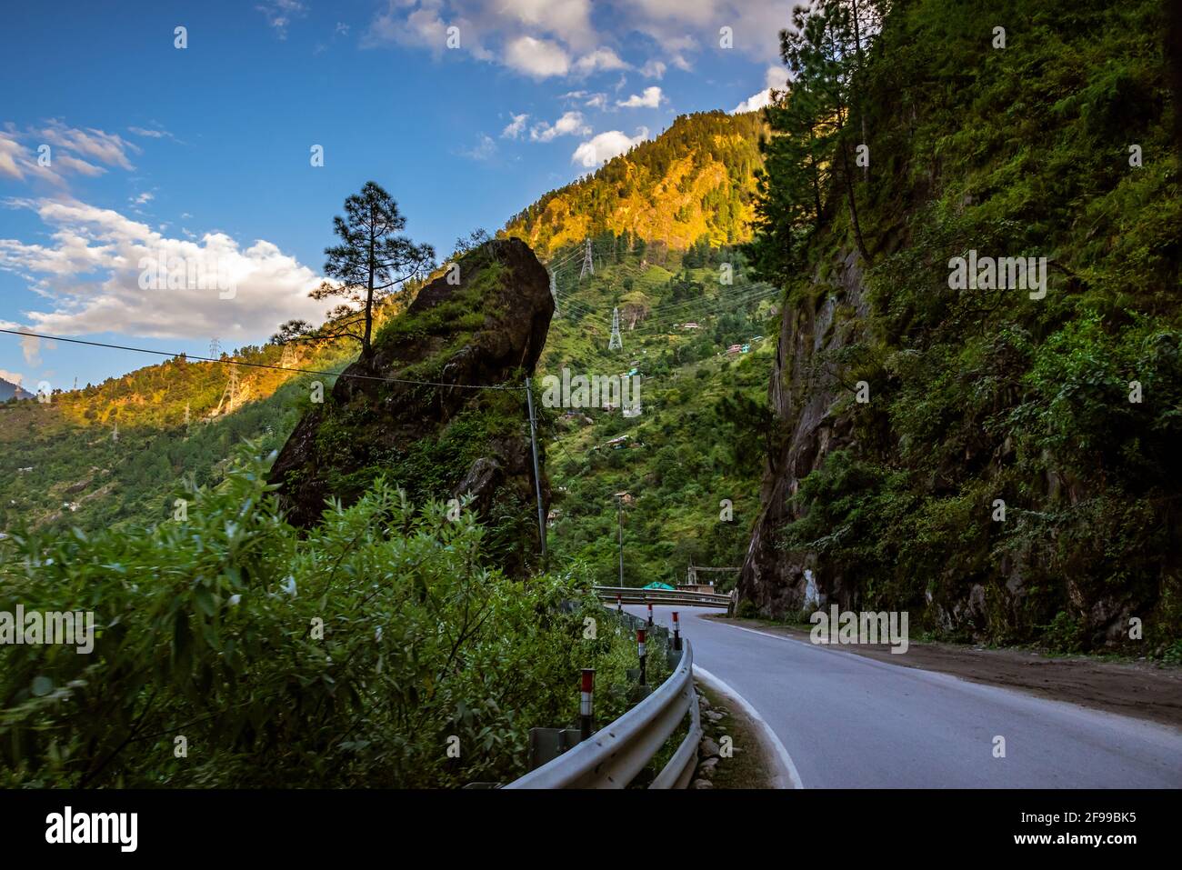 View from hilly mountain road travelling through Himalayas mountains ...