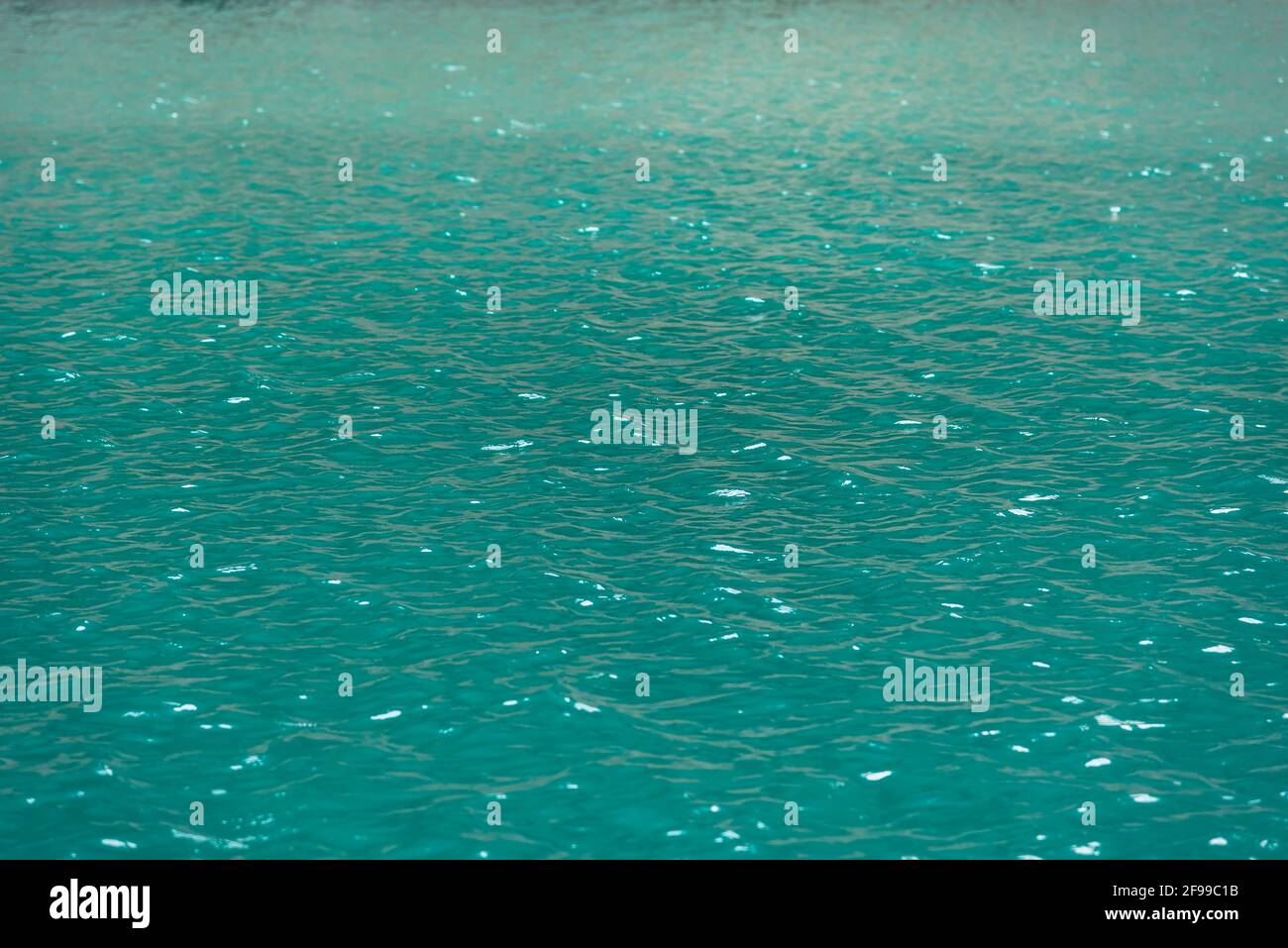 Turquoise river water for background or wallpaper Stock Photo - Alamy