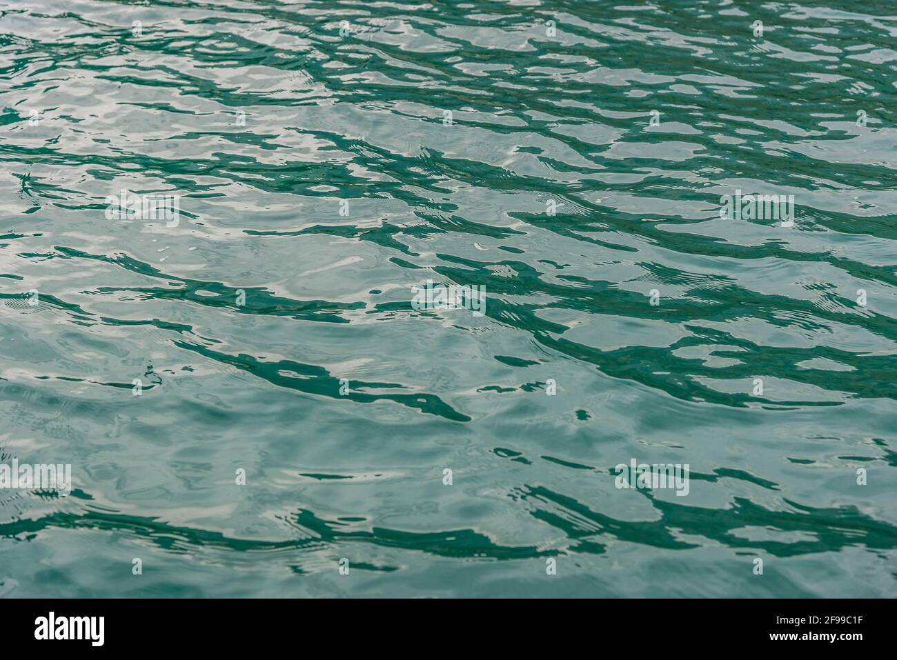 Turquoise river water for background or wallpaper Stock Photo - Alamy