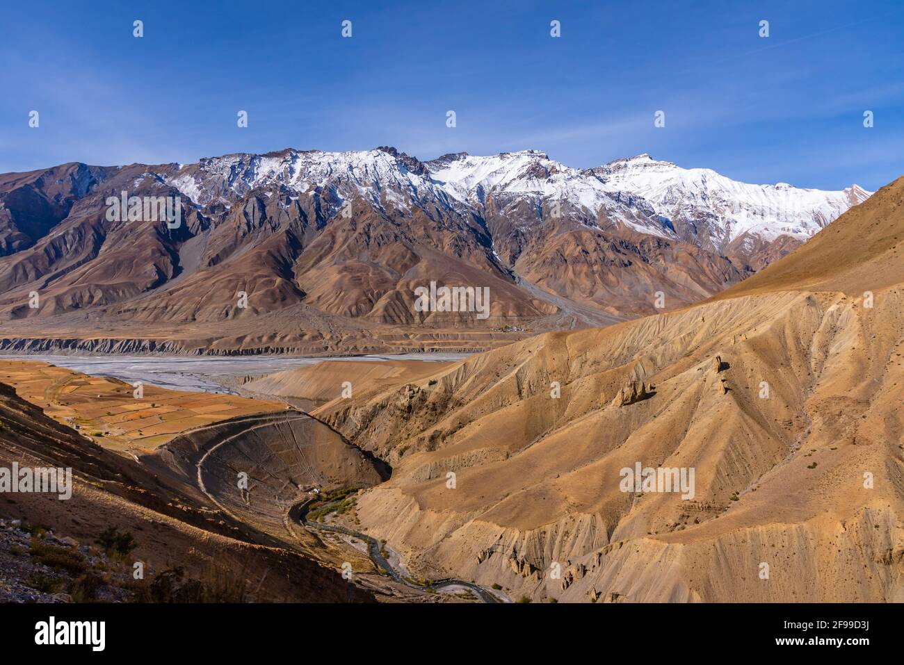 Serene Landscape of Spiti river valley and snow capped mountains during ...