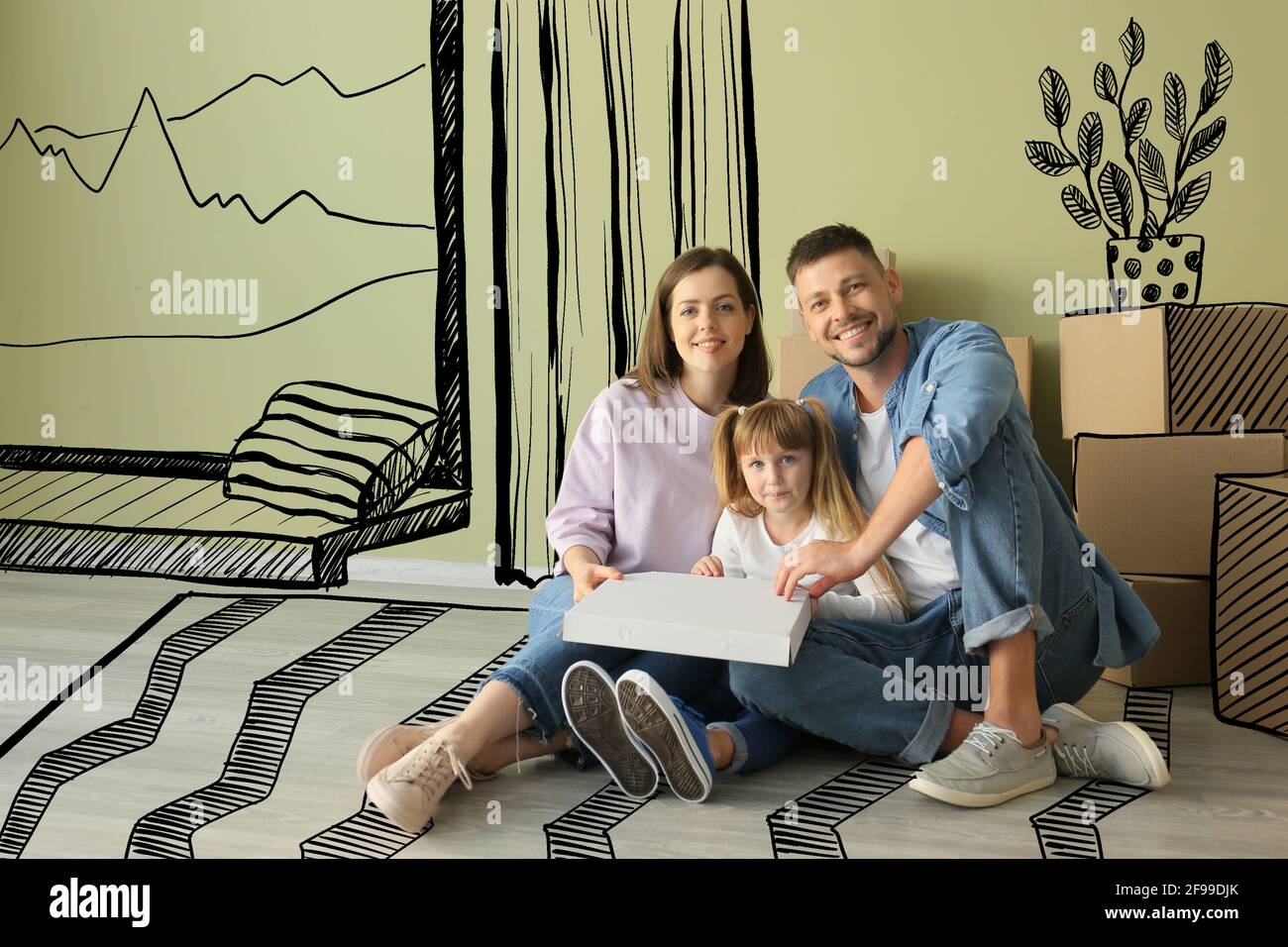 Happy family with pizza in their new house on moving day Stock Photo ...