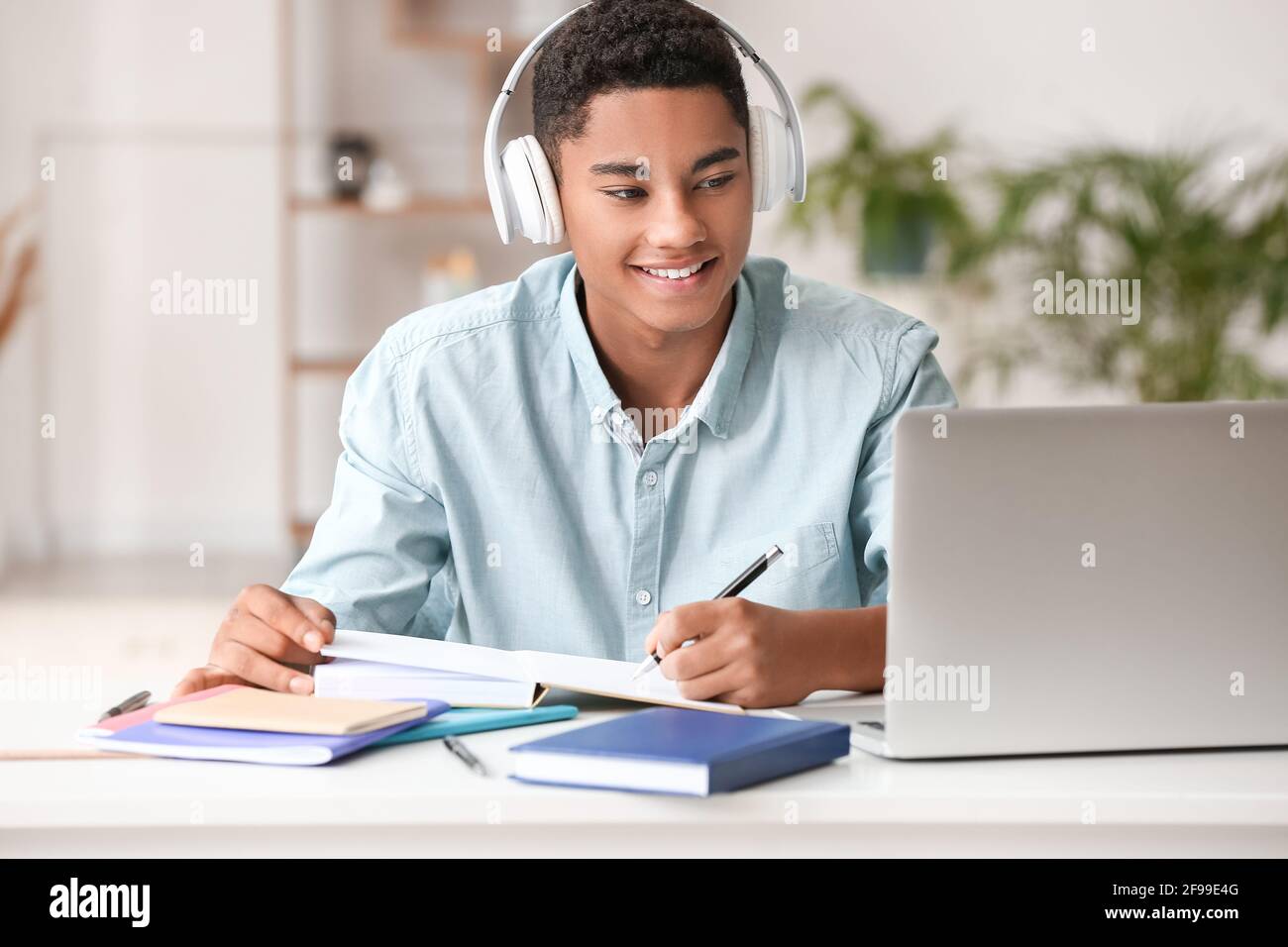 African-American student studying online at home Stock Photo - Alamy