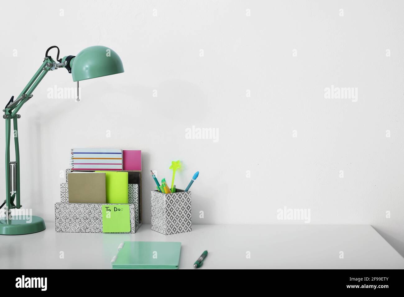 Stylish workplace with organizer and stationery Stock Photo - Alamy