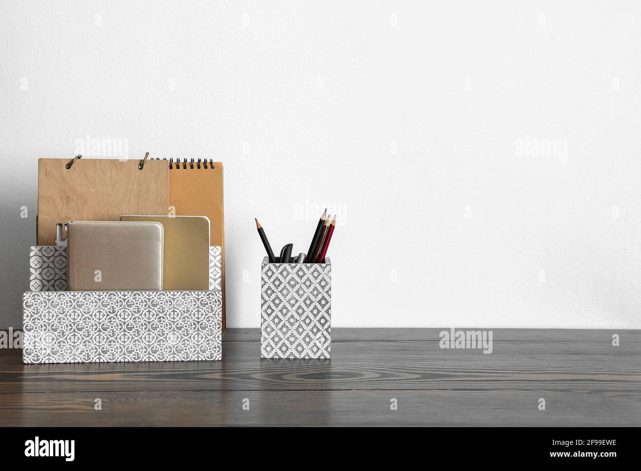 Modern workplace with organizer in room Stock Photo - Alamy