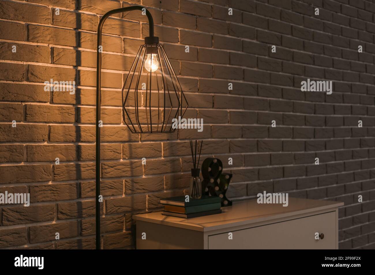 Glowing lamp chest drawers hi-res stock photography and images - Alamy