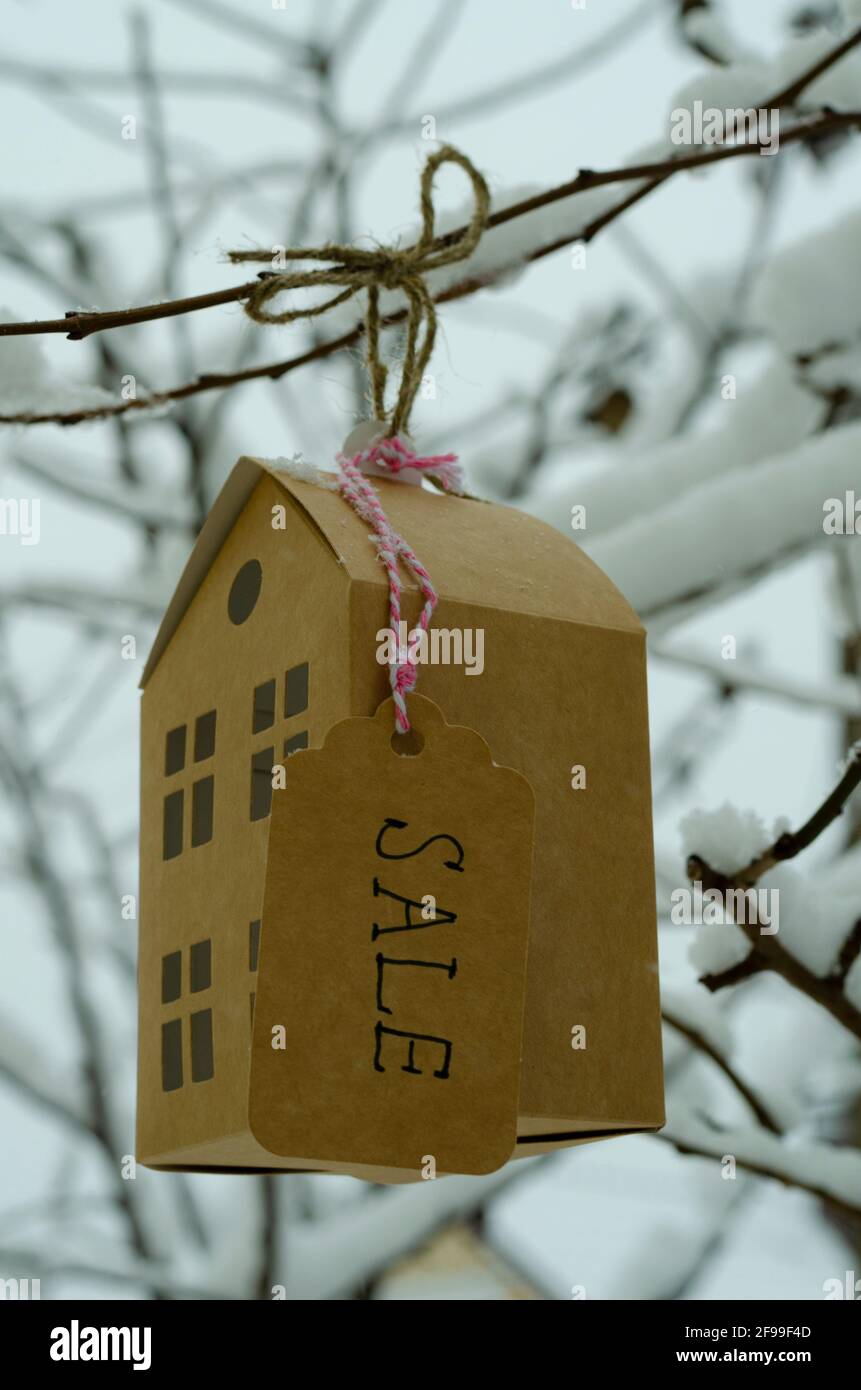 Real estate sale concept, paper model of residential building. Studio ...