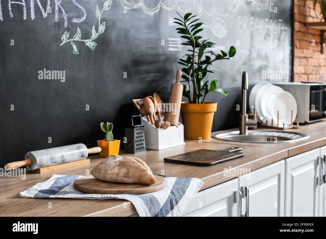Fresh bread on counter in kitchen Stock Photo - Alamy