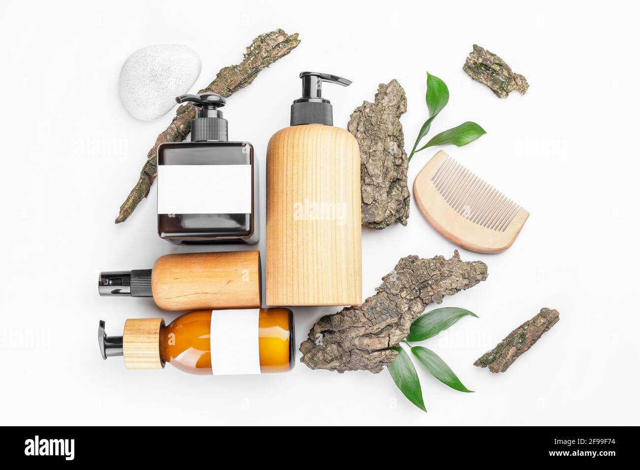 Bottles with natural shampoo on white background Stock Photo - Alamy