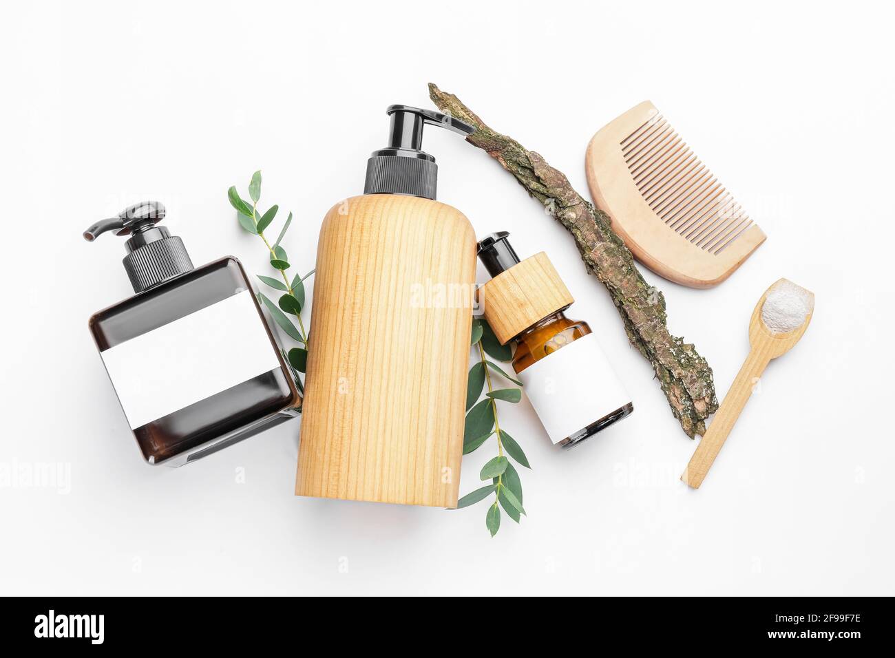 Bottles with natural shampoo on white background Stock Photo - Alamy