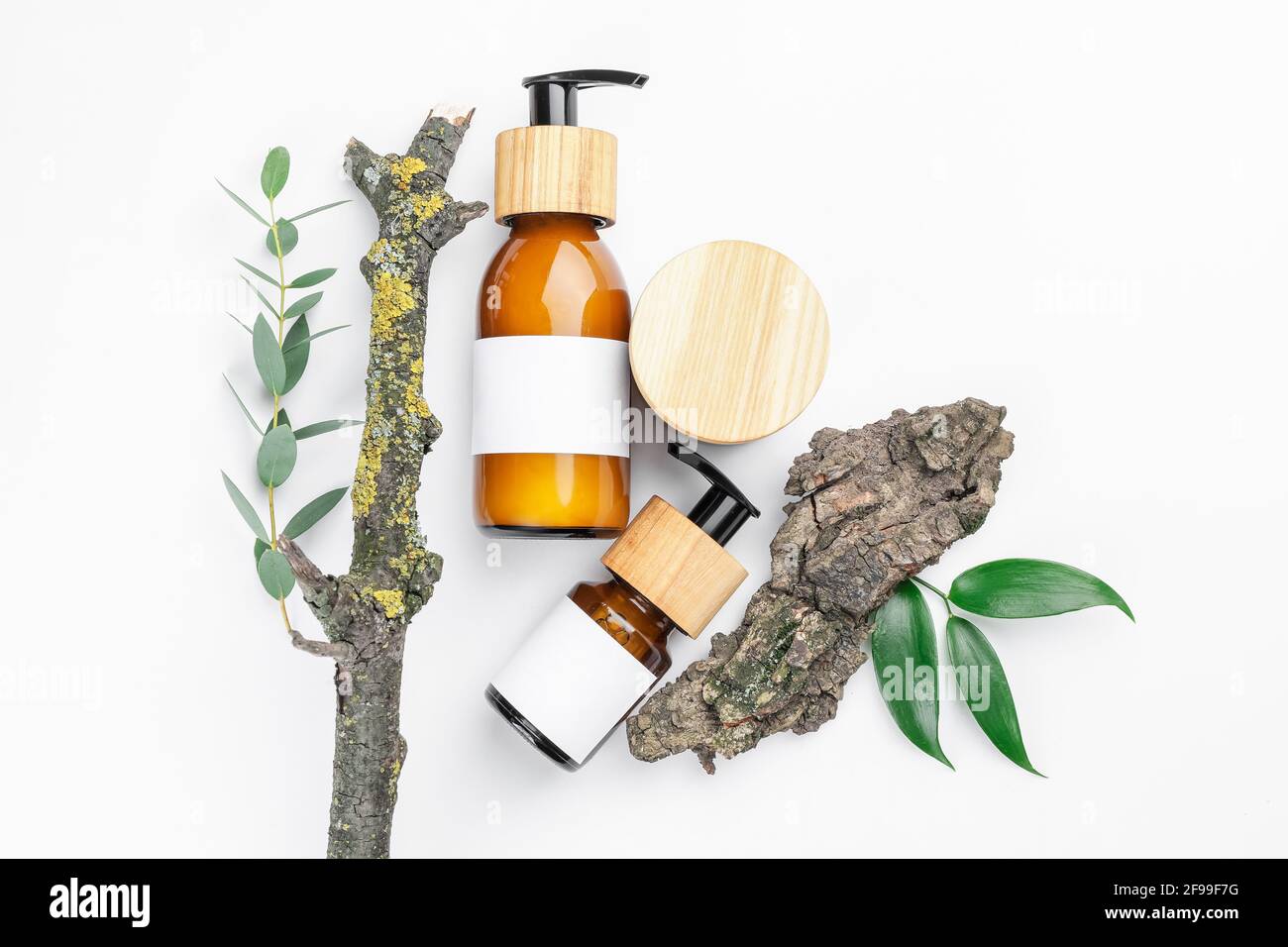 Bottles with natural shampoo on white background Stock Photo - Alamy