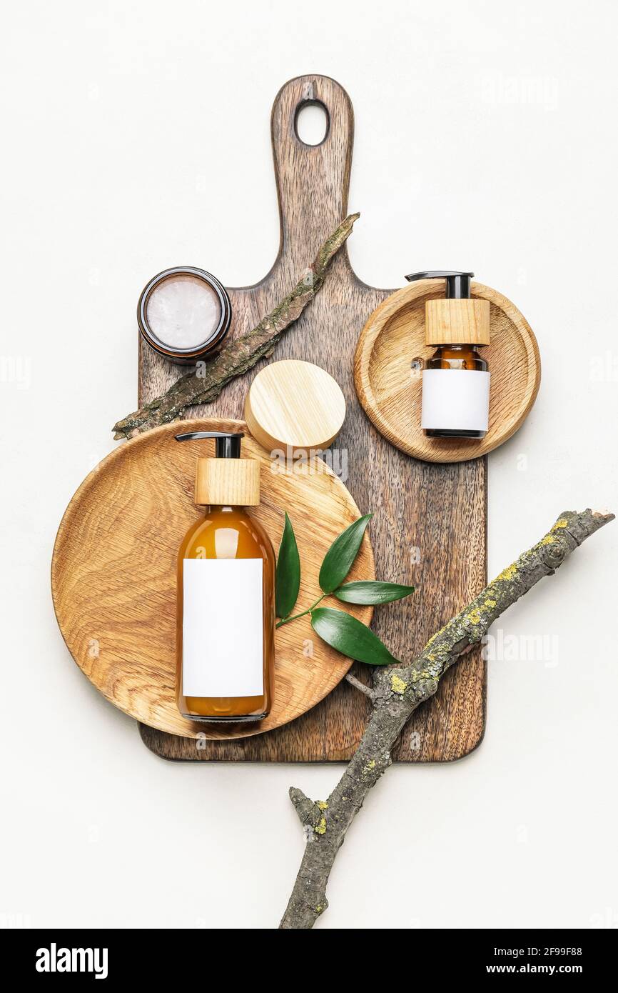 Bottles with natural shampoo on white background Stock Photo - Alamy