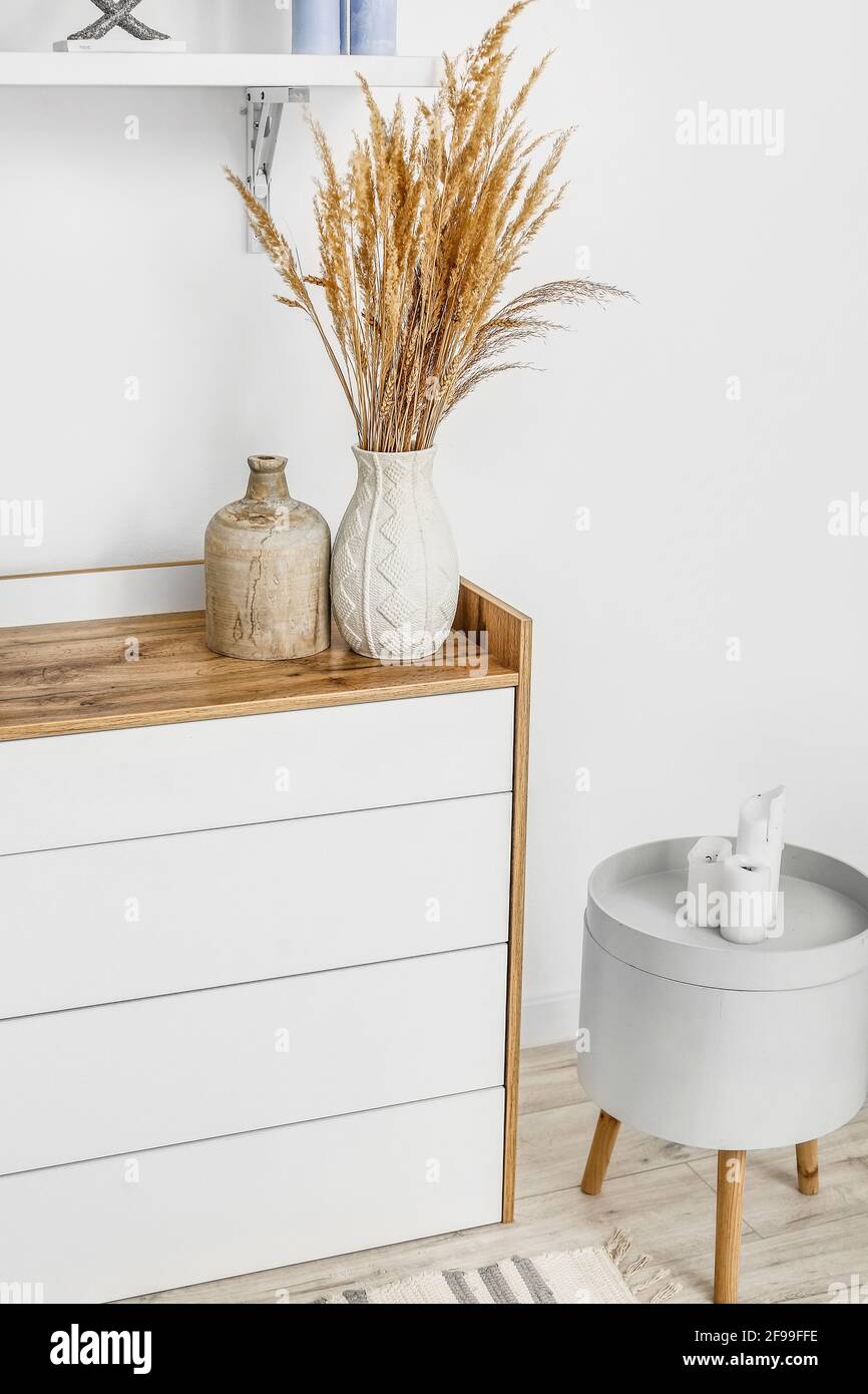 Modern living room with chest of drawers Stock Photo - Alamy