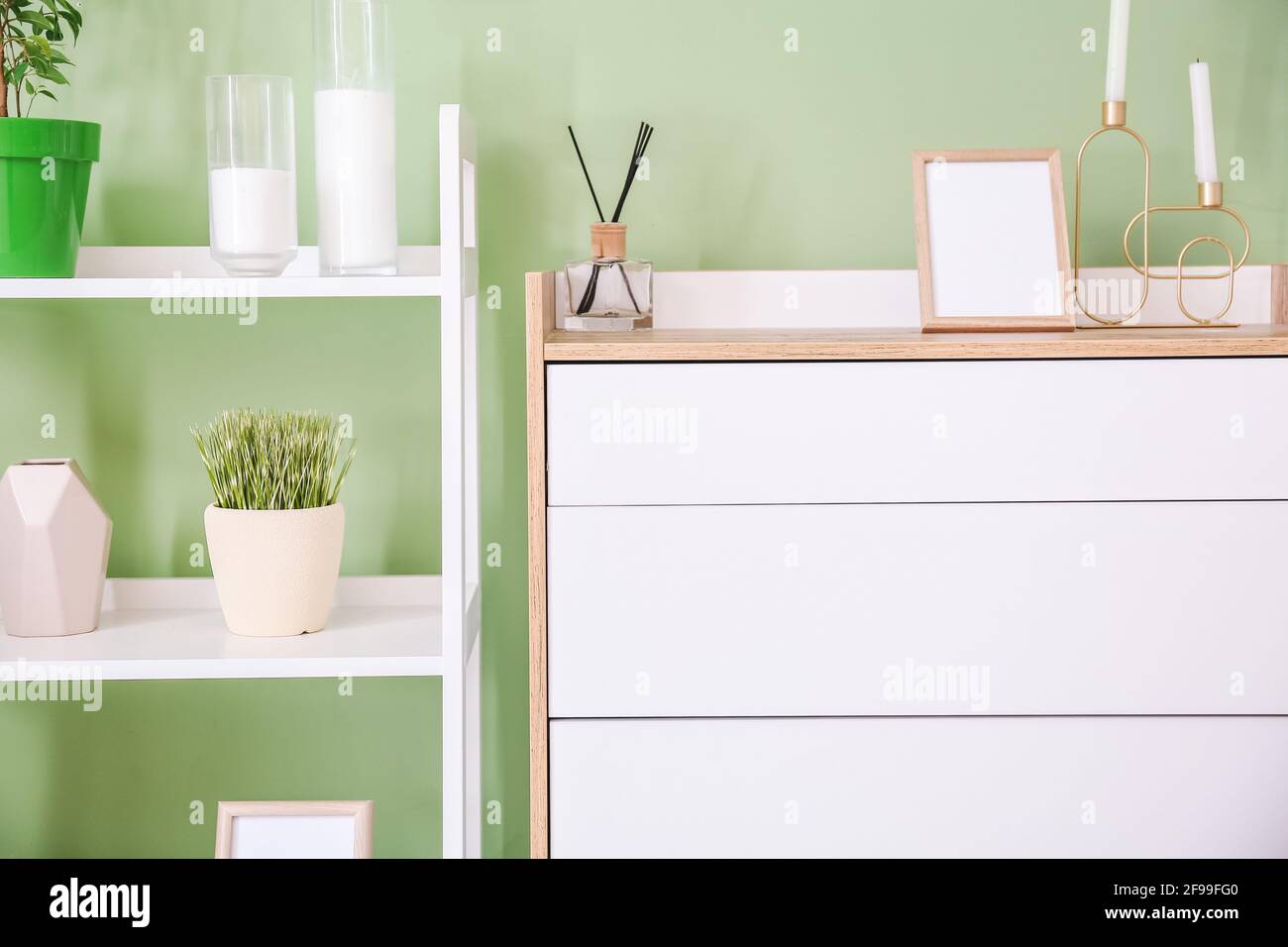 Modern living room with chest of drawers Stock Photo - Alamy