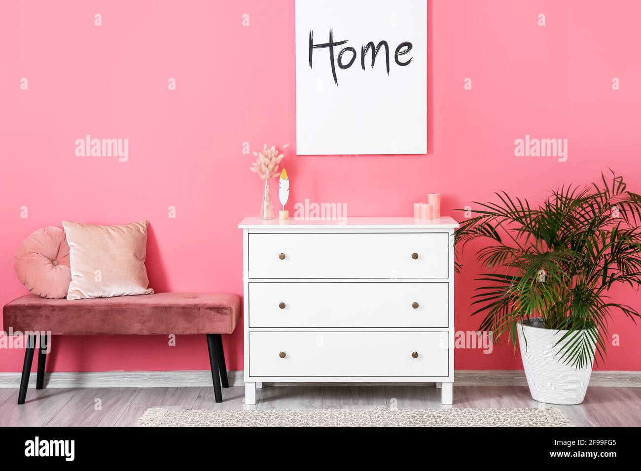 Modern living room with chest of drawers Stock Photo - Alamy