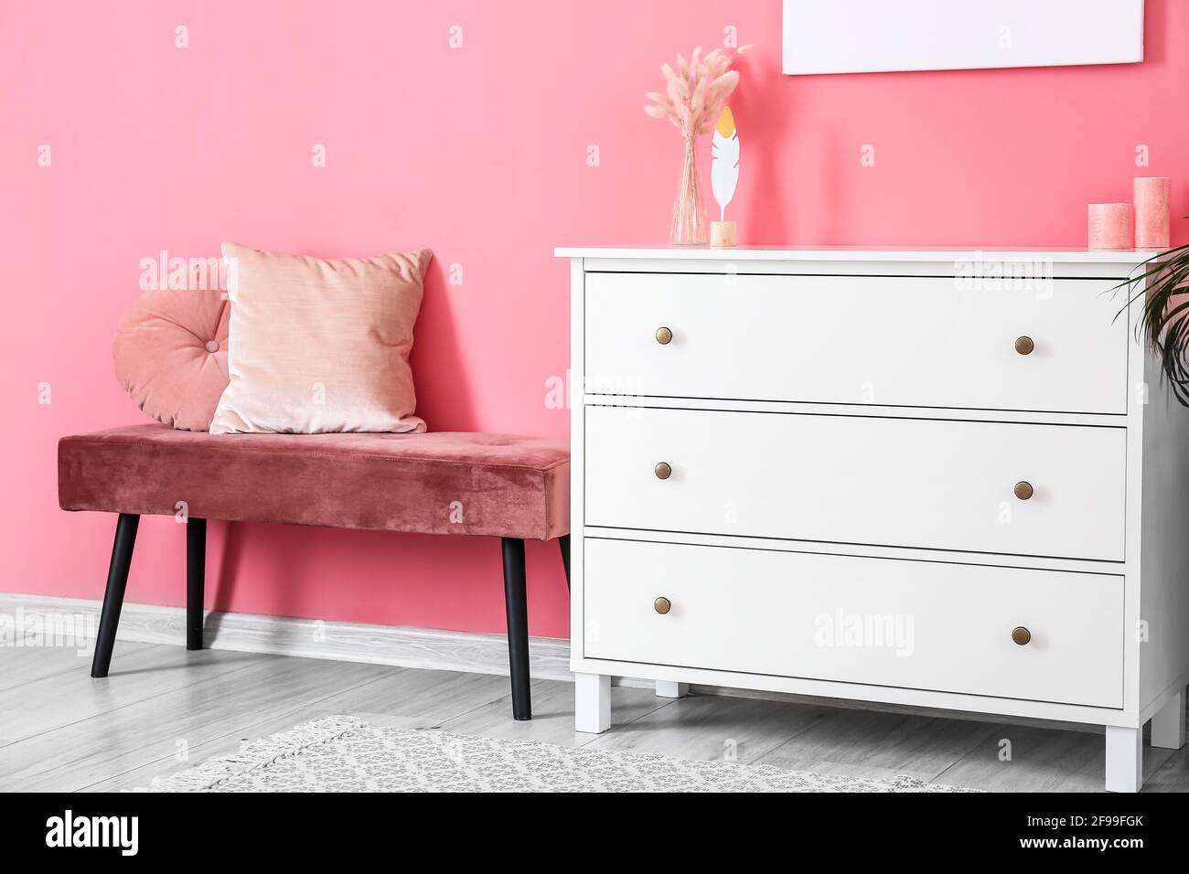Modern living room with chest of drawers Stock Photo - Alamy